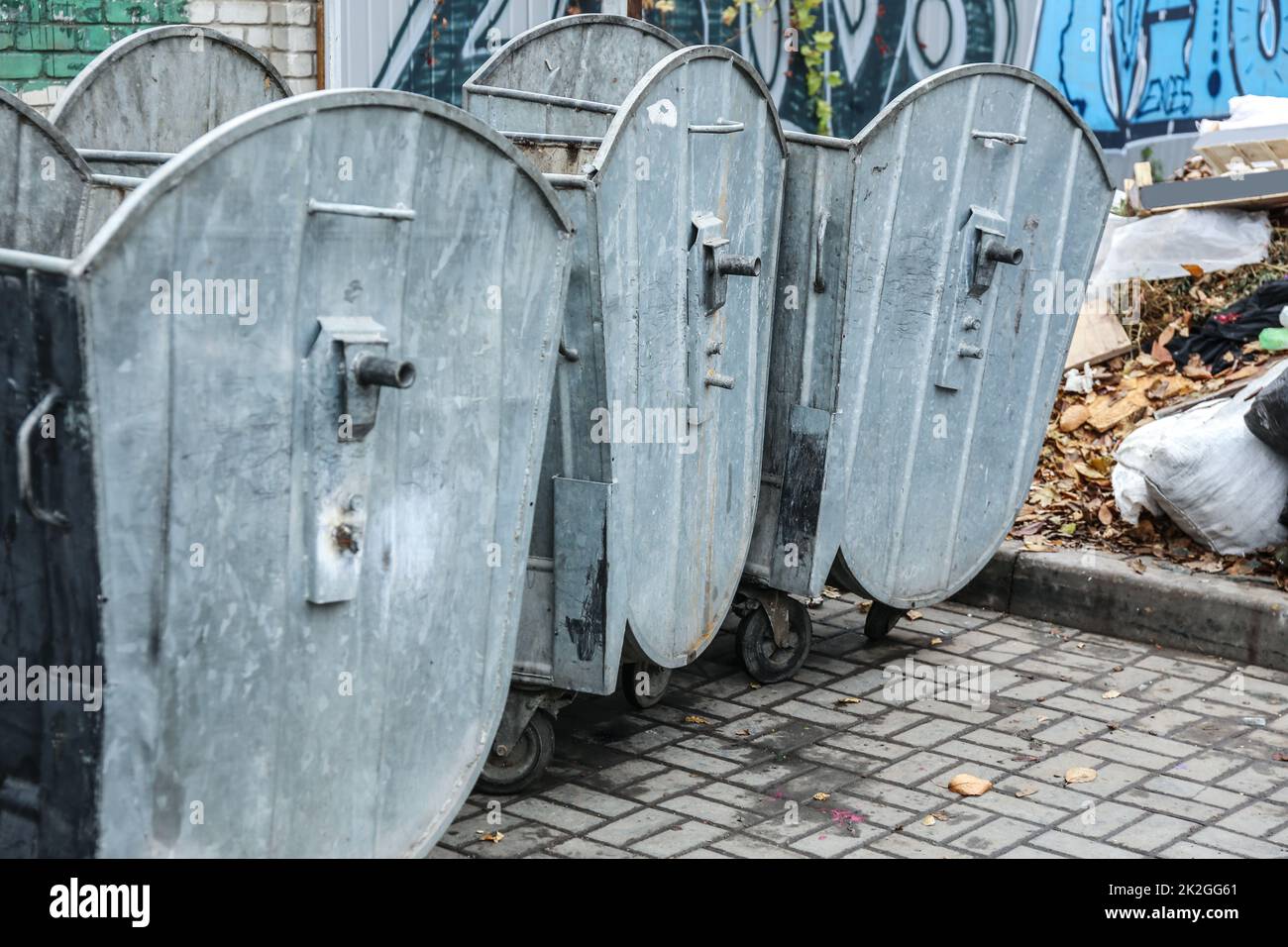 Metal garbage container outdoors Stock Photo - Alamy