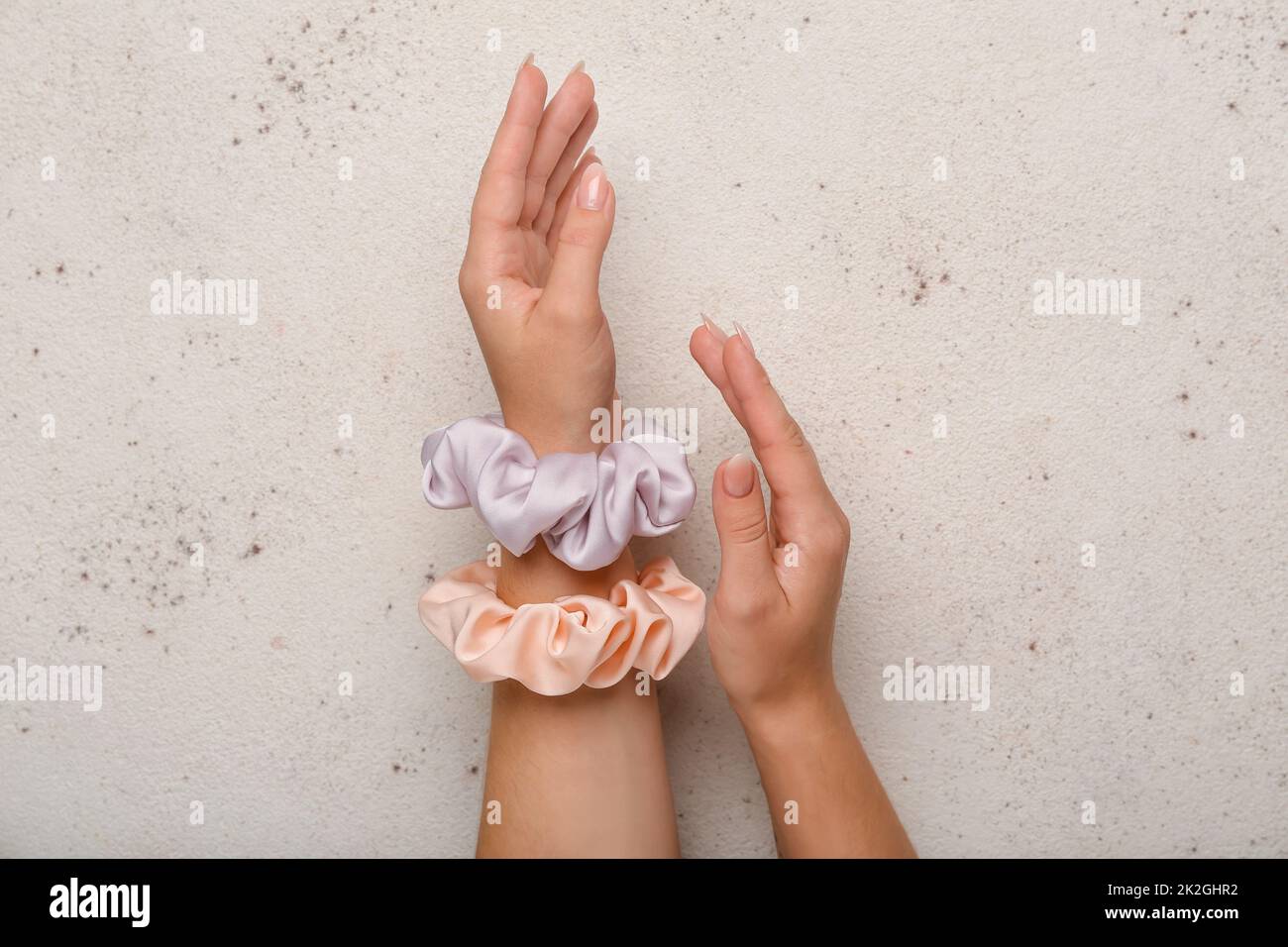 Top view female hands attaching hi-res stock photography and images - Alamy