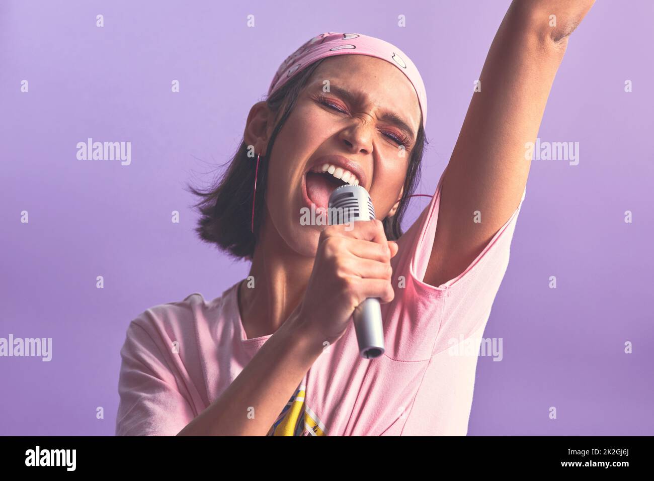 Sing with your soul, not your voice. Studio shot of a beautiful young ...