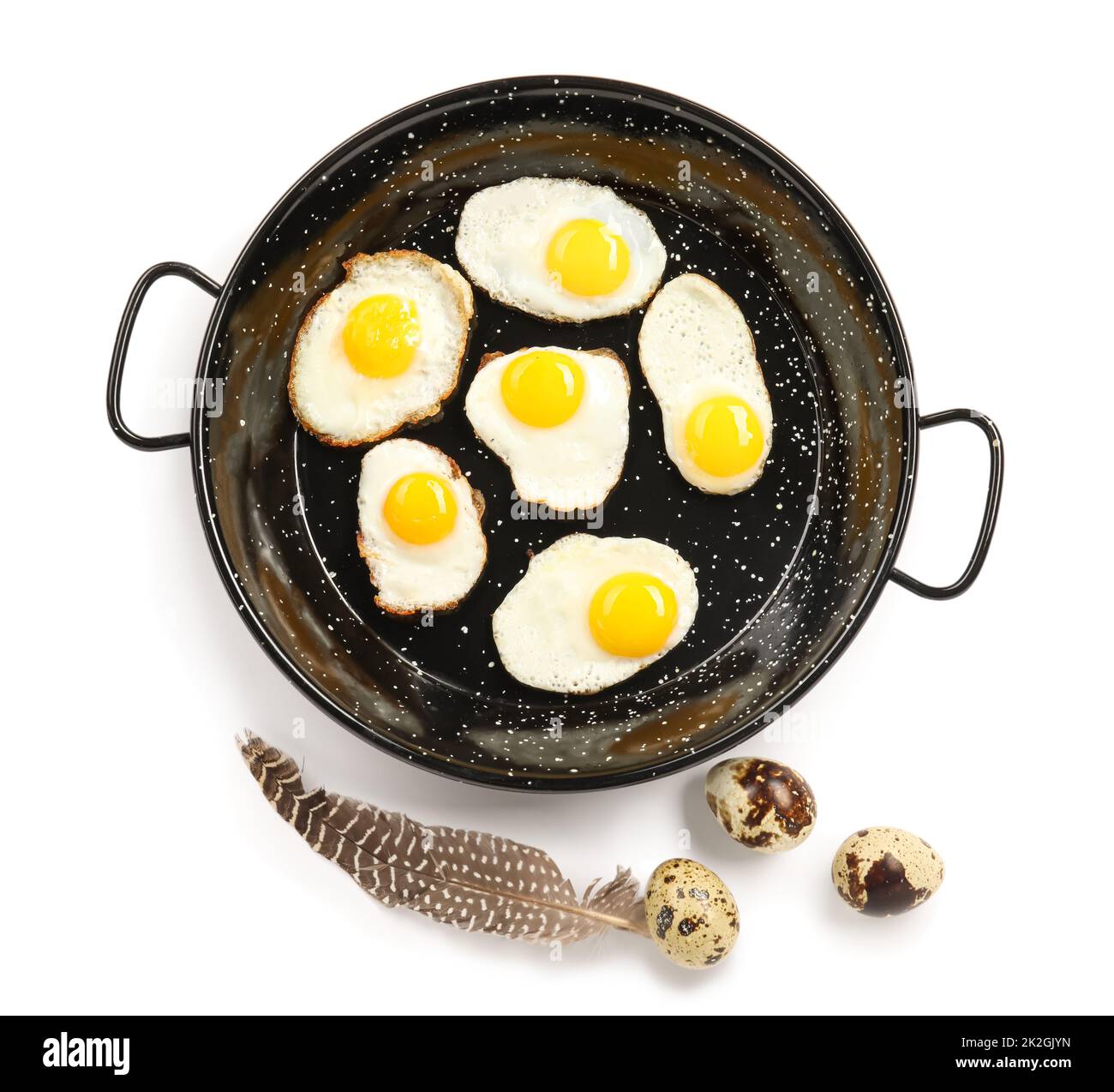 Frying pan with fried quail eggs isolated on white background Stock ...