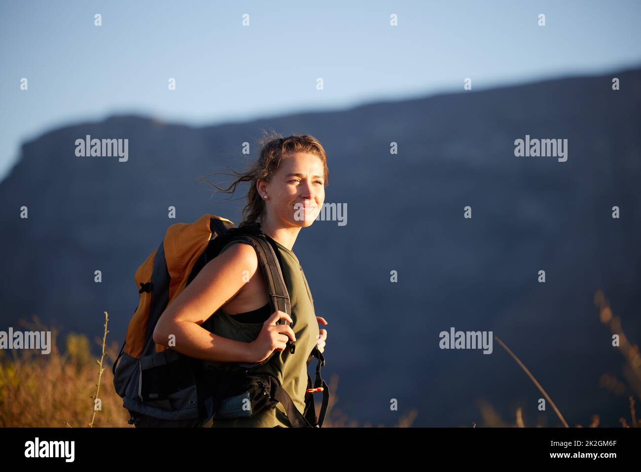 A walk in nature walks the soul back home. Shot of a beautiful young ...