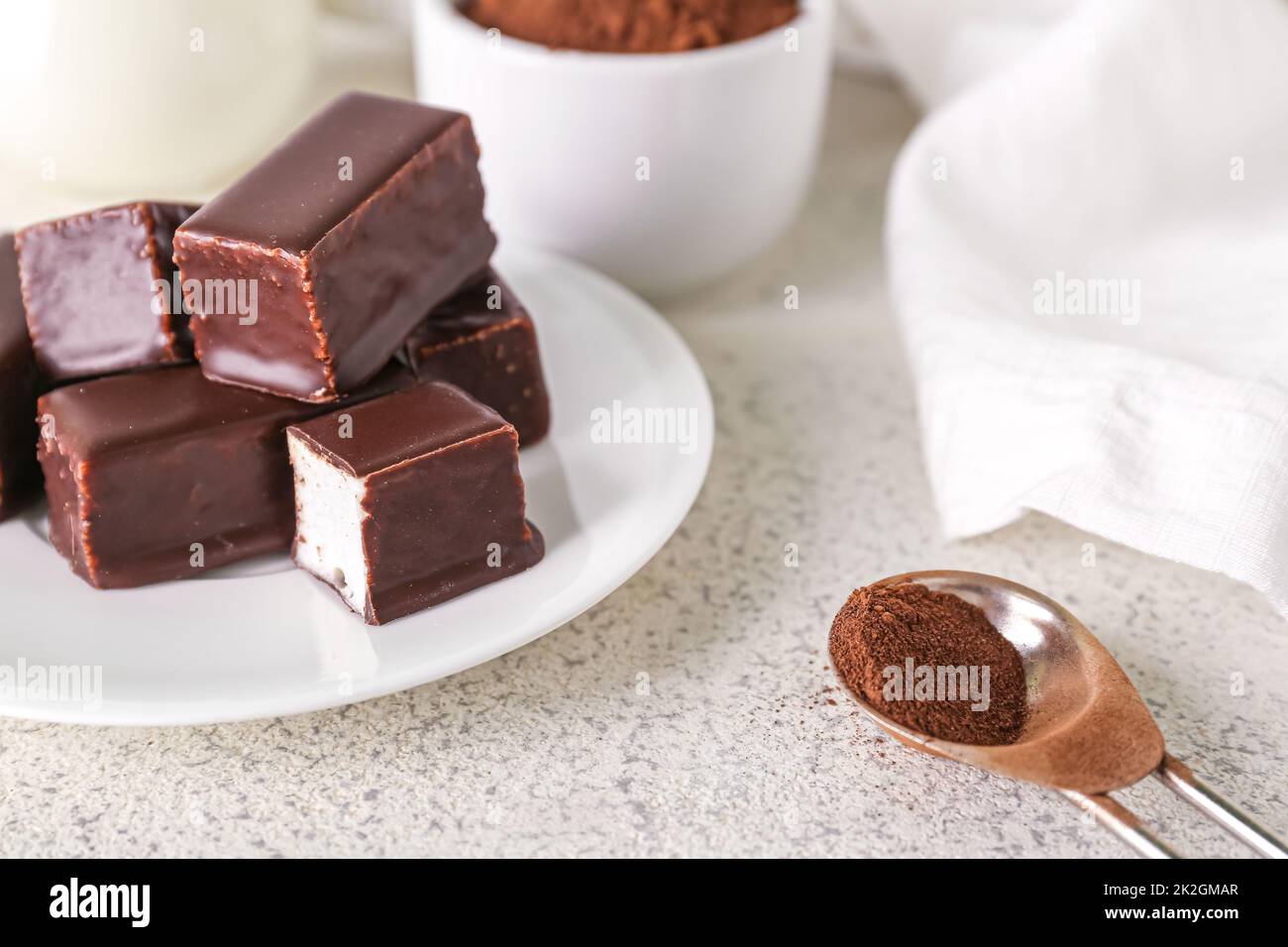 Plate with tasty bird's milk candies on light background, closeup Stock ...