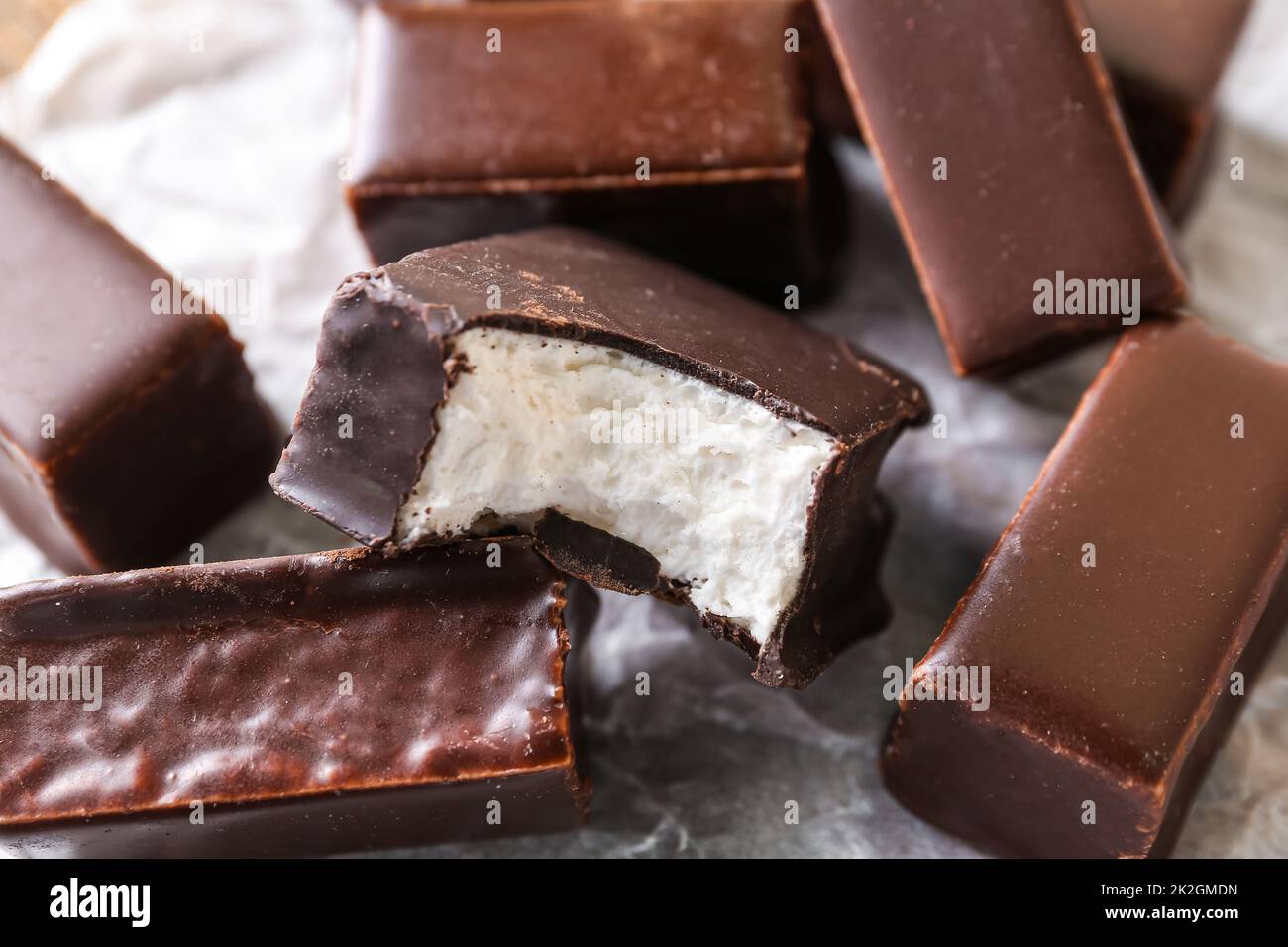 Delicious bird's milk candies on table, closeup Stock Photo - Alamy