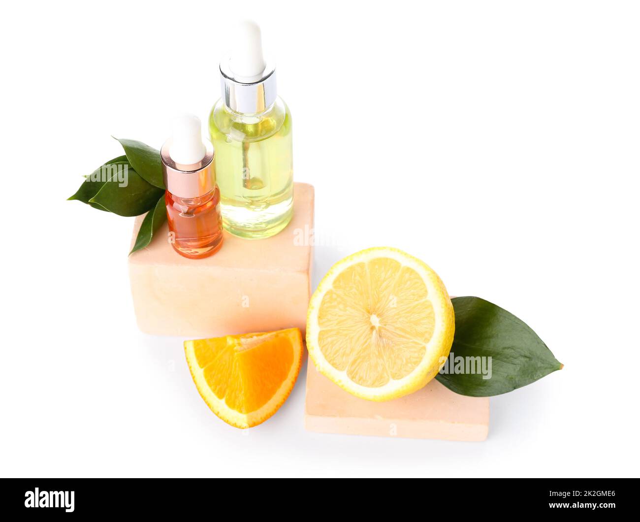 Composition with citrus serum and fruits on white background Stock ...