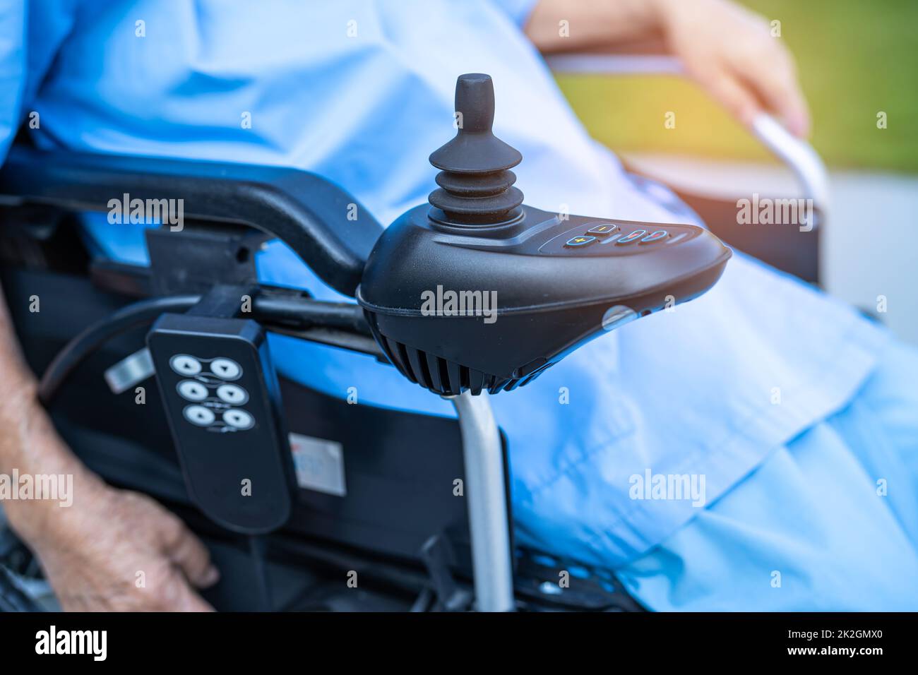 Asian senior or elderly old lady woman patient on electric wheelchair ...