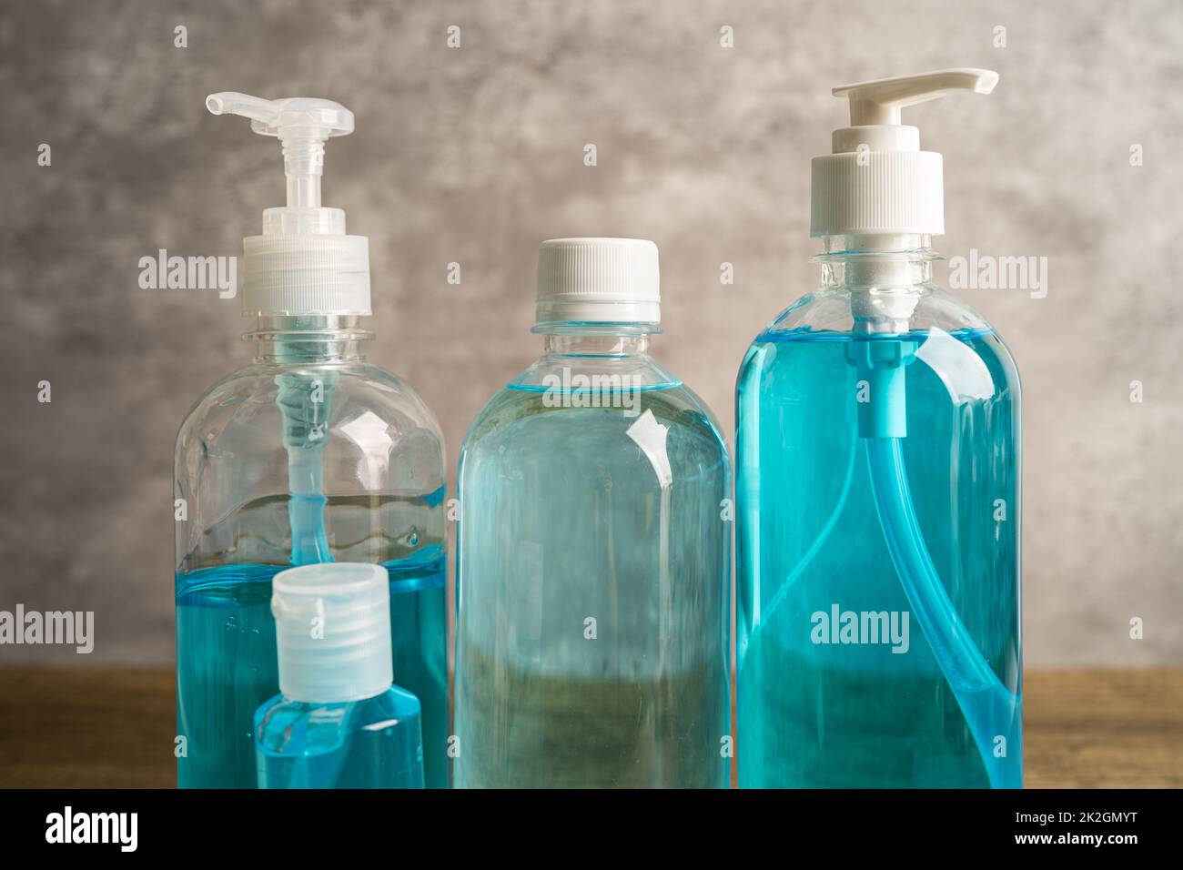 Blue alcohol sanitizer gel bottle for washing to protect safety ...