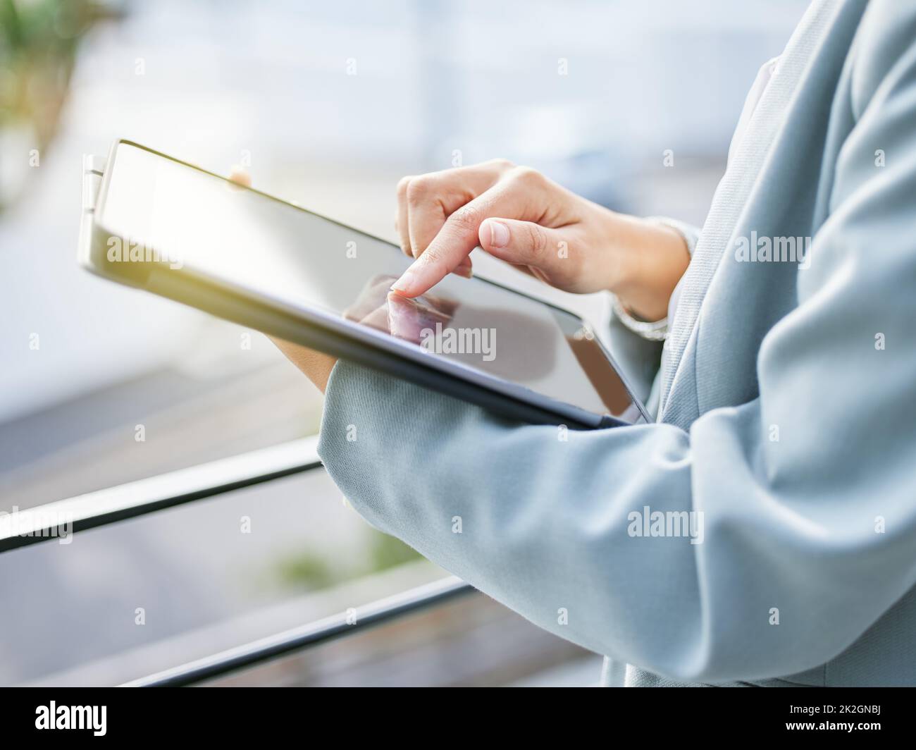 Business made easier with technology. Shot of an unrecognizable ...