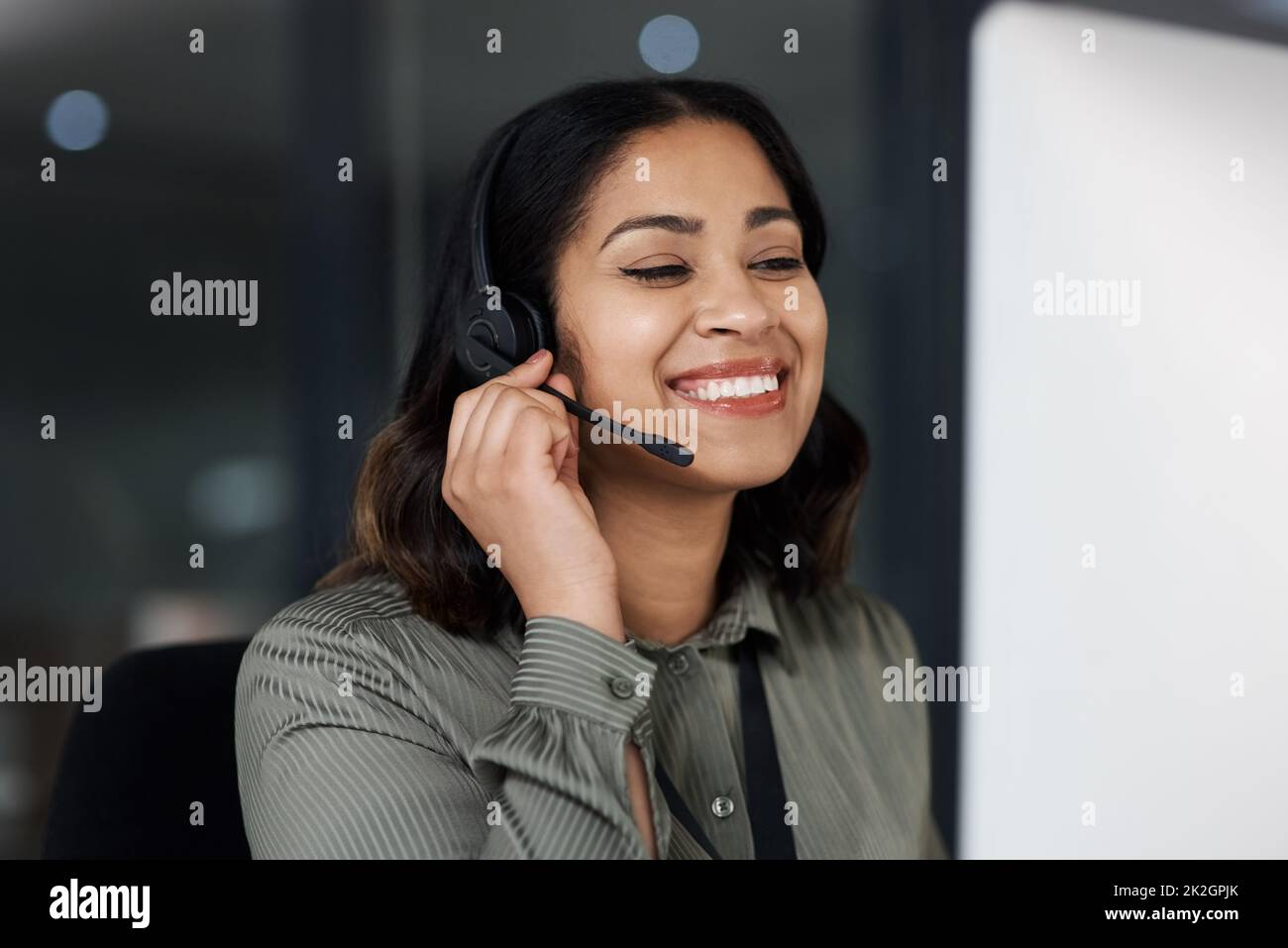 Were available to take your call 247. Shot of a woman wearing a headset ...