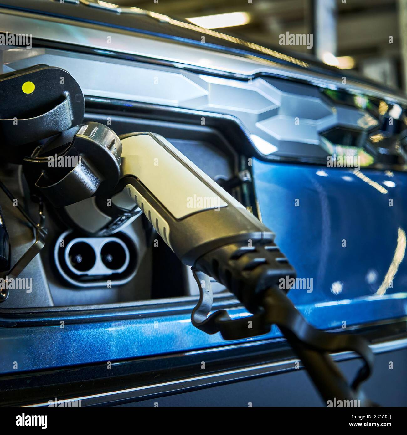 Plug of a charging station for electricity in the connection for ...