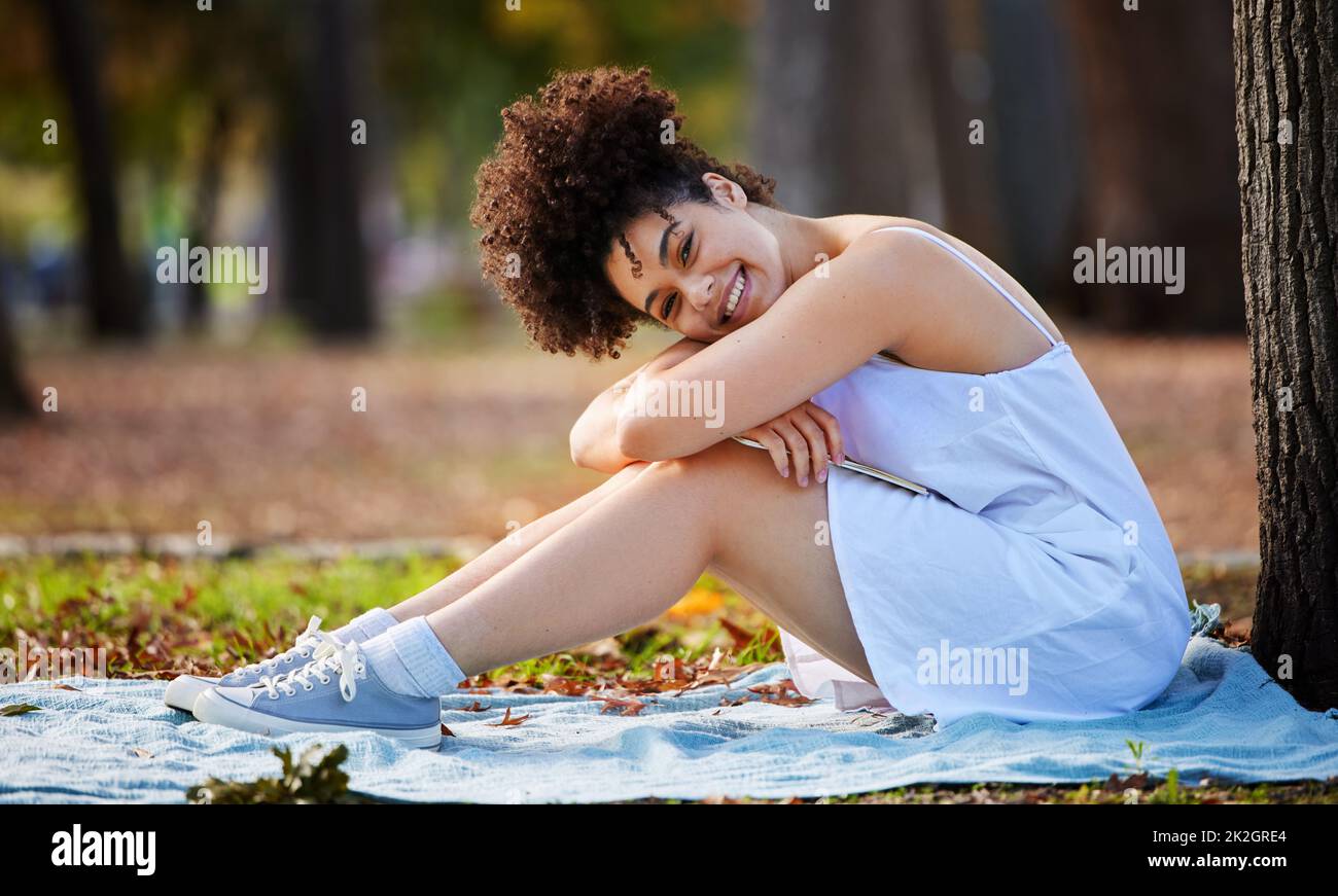 Happiness is... A day in the park. Full length portrait of an ...