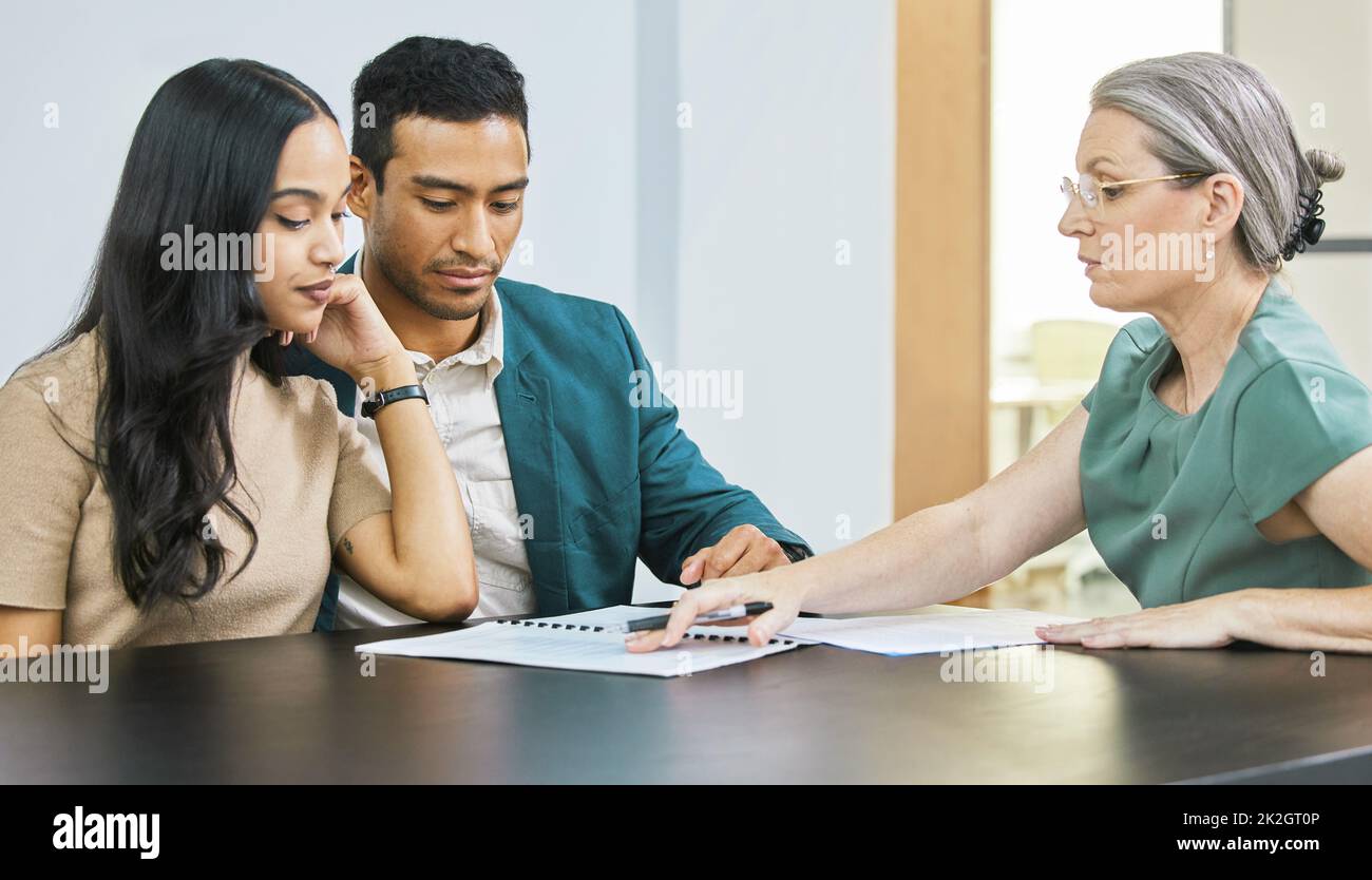 Couple going over paperwork hi-res stock photography and images - Alamy