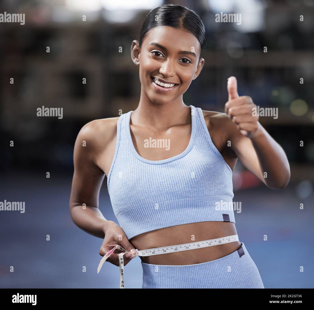 Indian woman measuring waist hi-res stock photography and images - Alamy