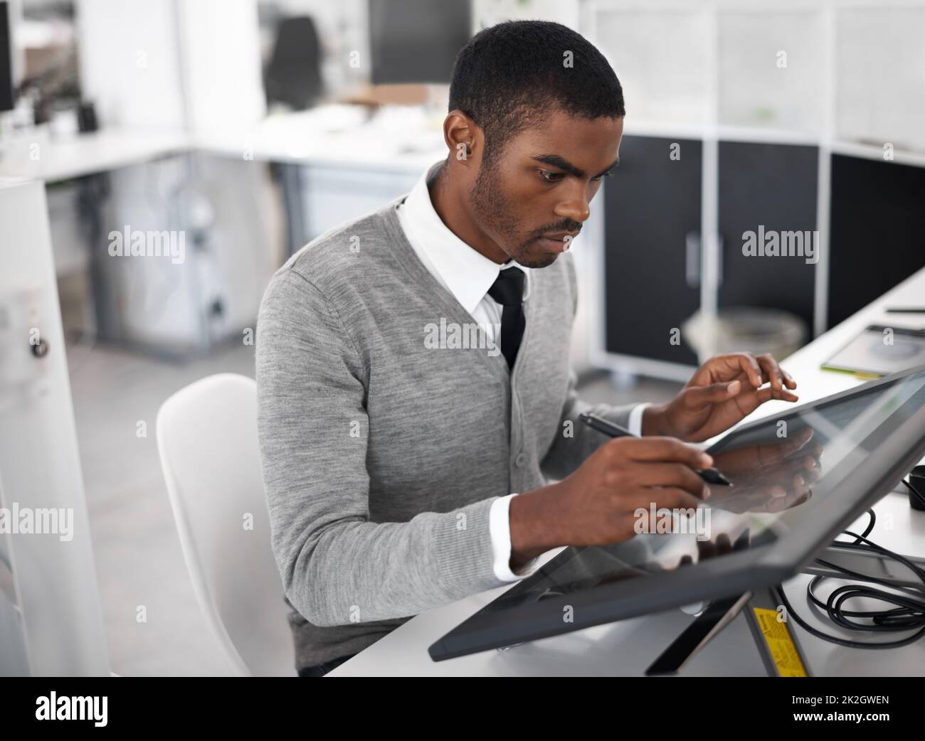 Smart technology makes everything easier. A young man working on a ...