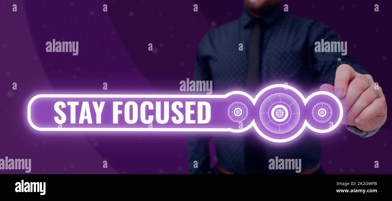 Conceptual caption Stay Focused. Word Written on Be attentive Concentrate Prioritize the task ...