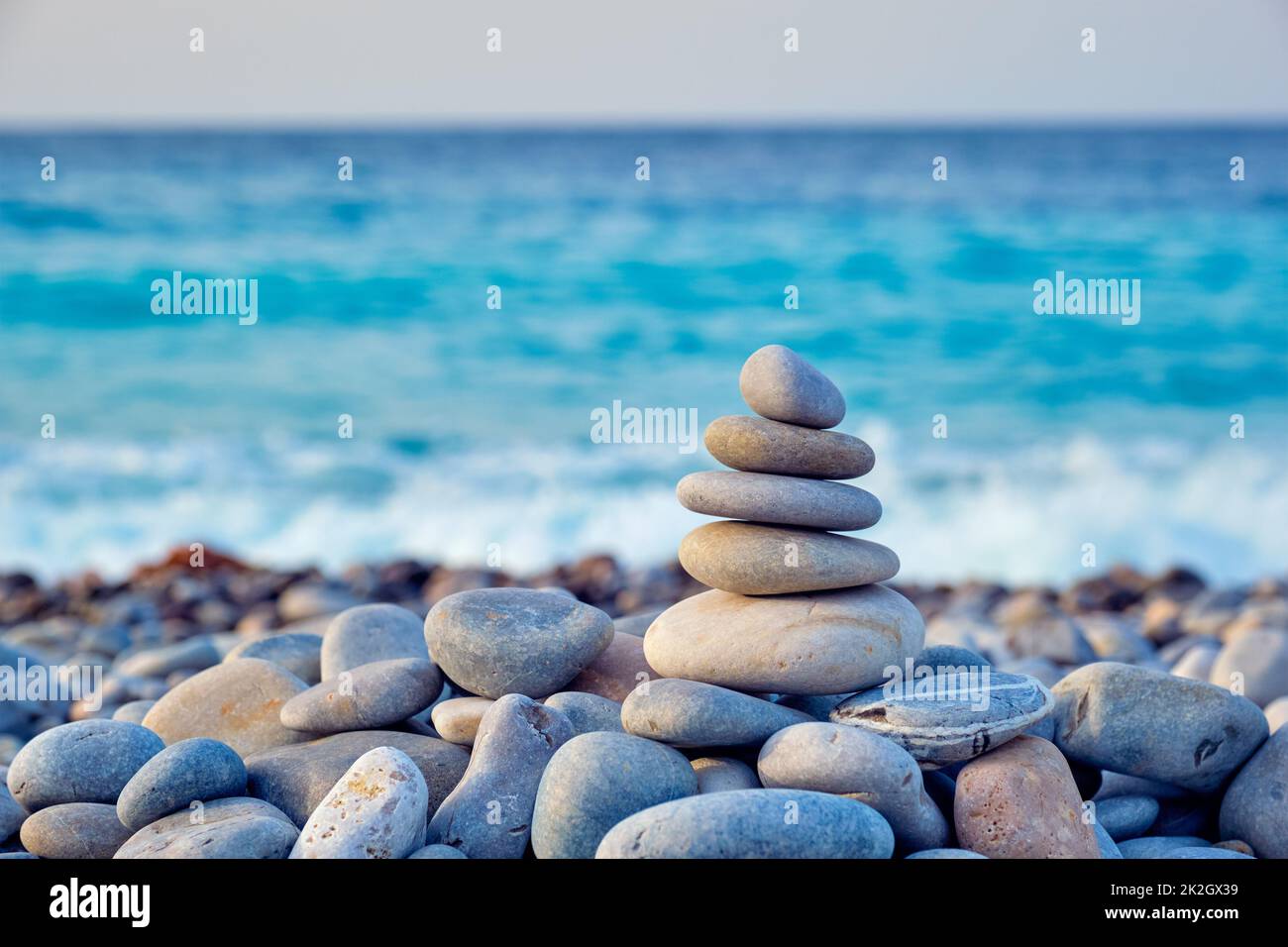 Zen balanced stones stack on beach Stock Photo - Alamy