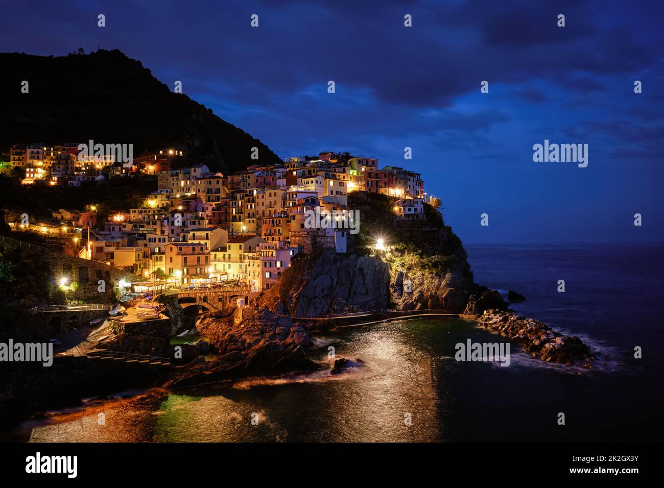 Manarola village in the night, Cinque Terre, Liguria, Italy Stock Photo ...