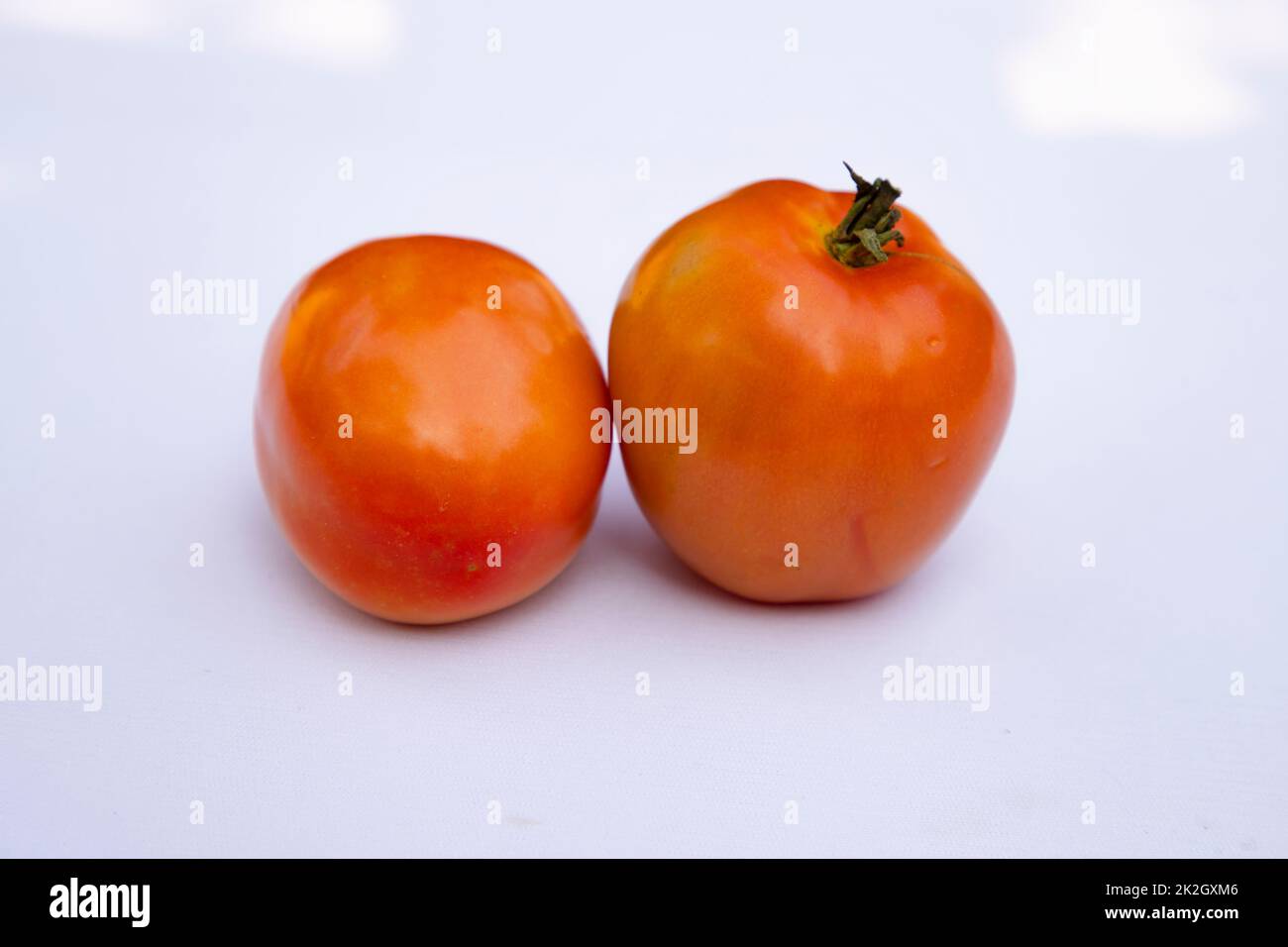 Red tomato tomatoes vegetables organic hi-res stock photography and ...