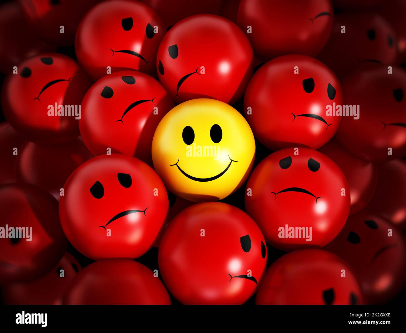 Yellow smiling face stands out against red spheres Stock Photo - Alamy