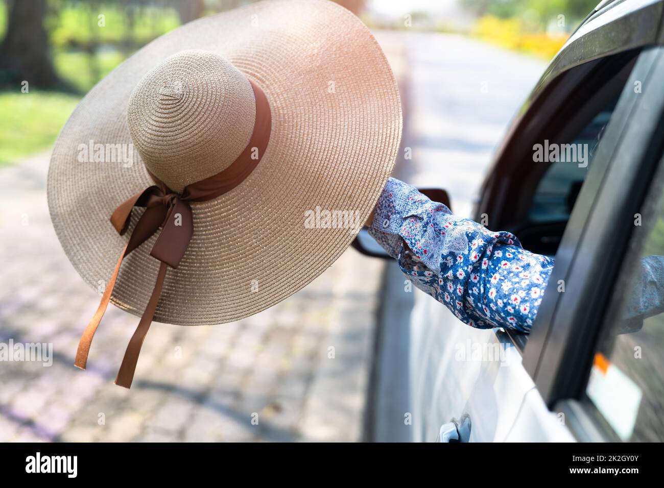 Happy enjoy and freedom in traveling trip with raised hand and holding ...