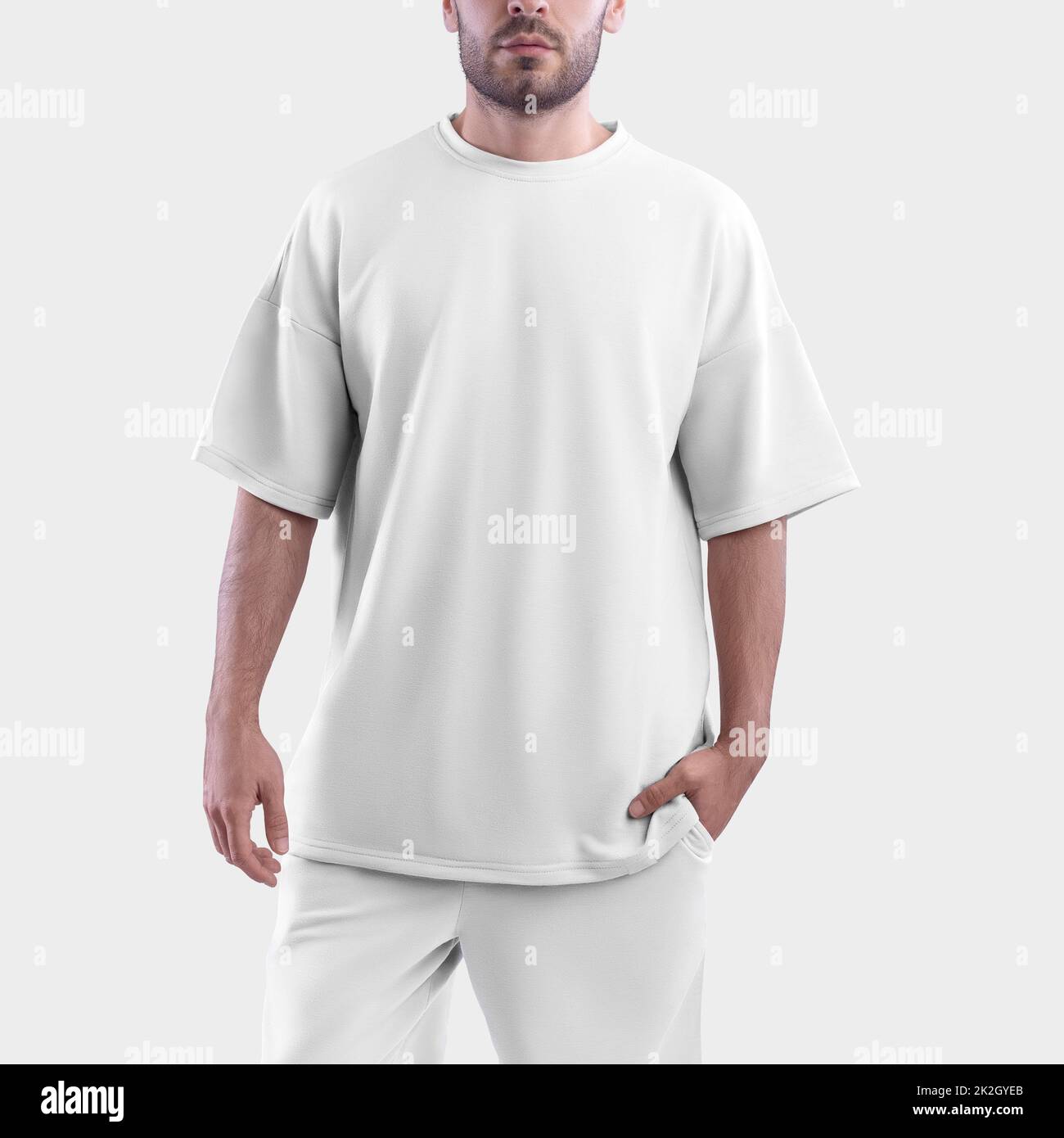 Mockup of a white oversize t-shirt on a man. Template isolated on white ...