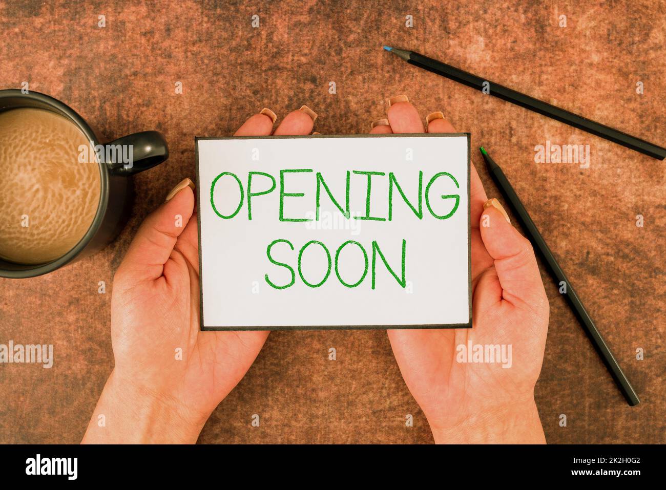 Hand writing sign Opening Soon. Conceptual photo Going to be available ...