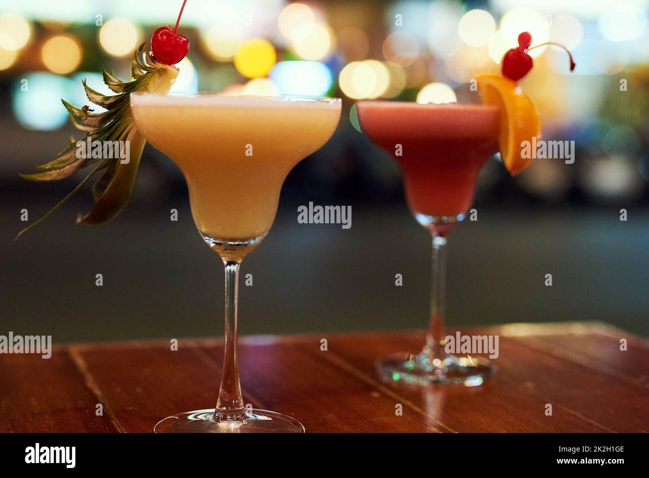 Get ready to party. Shot of two cocktails on a table in a bar Stock ...