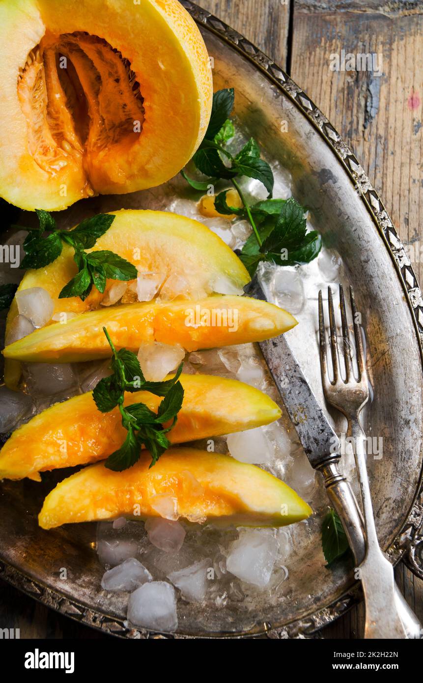 Melon slices hi-res stock photography and images - Alamy
