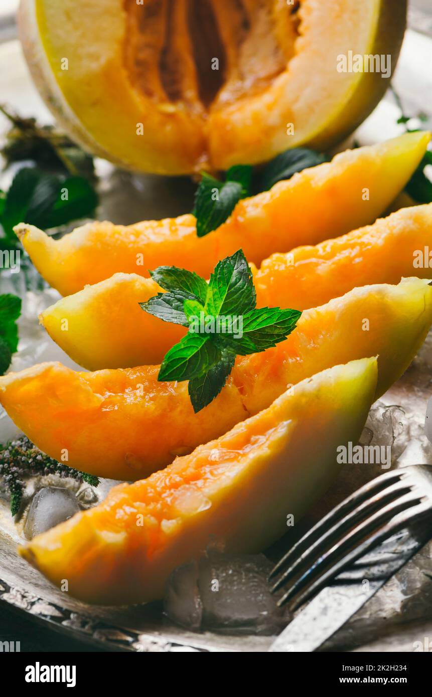 Melon slices hi-res stock photography and images - Alamy