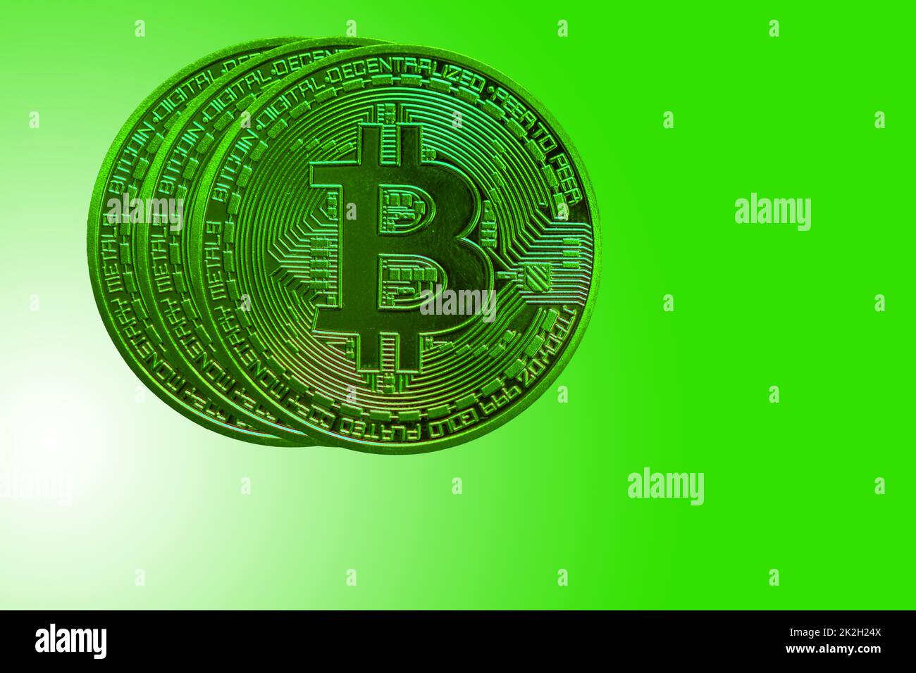 four green bitcoin from crypto currency during rising market on green ...