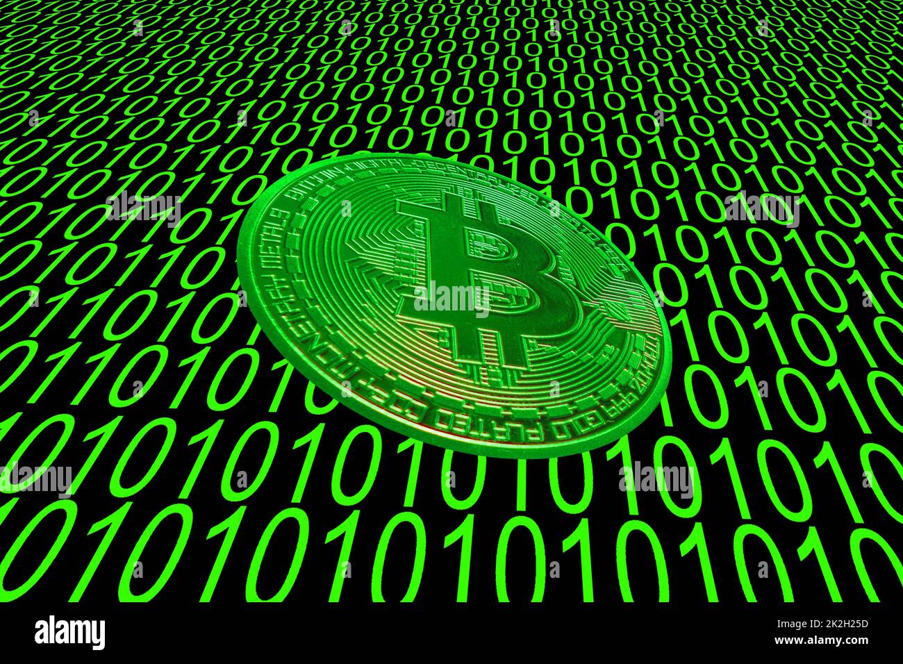 green binary code and a valueable green bitcoin from crypto currency ...