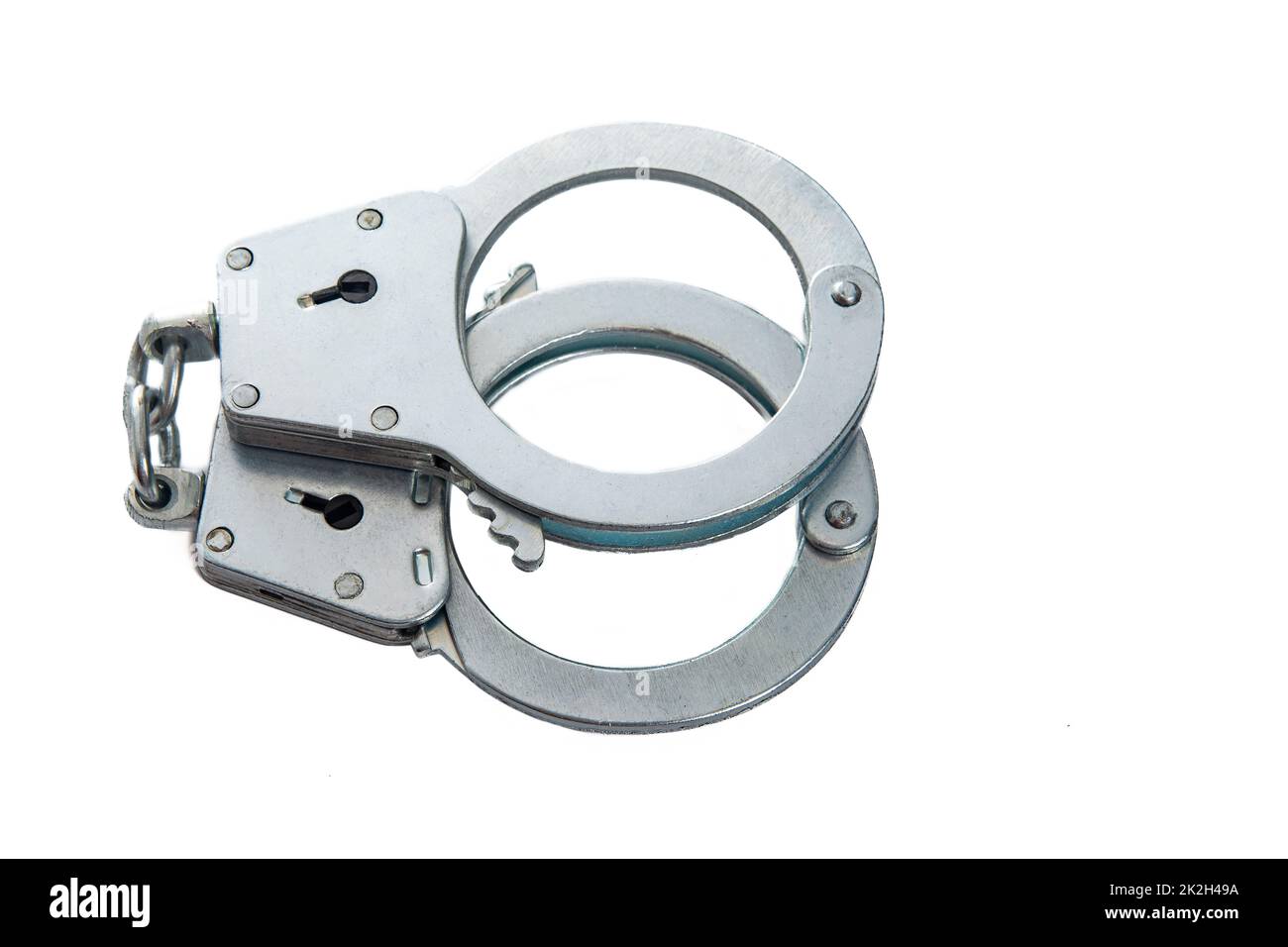 Metal handcuffs on a white isolated background, copy space Stock Photo ...