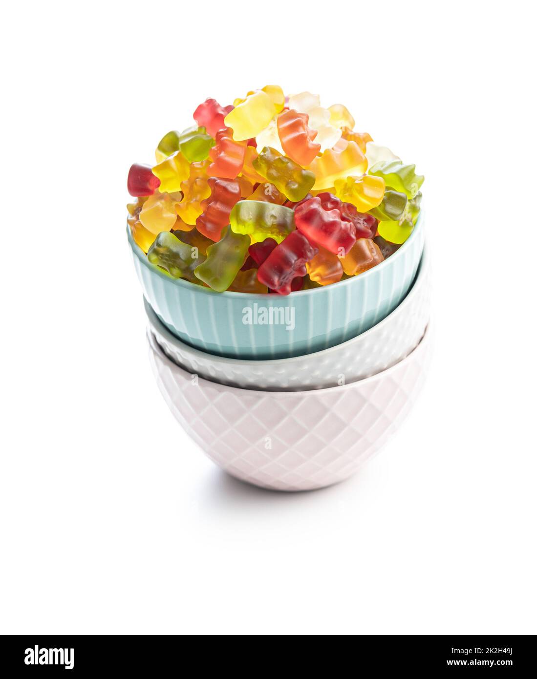 Jelly gummy bears candy in bowl. Colorful sweet confectionery isolated ...
