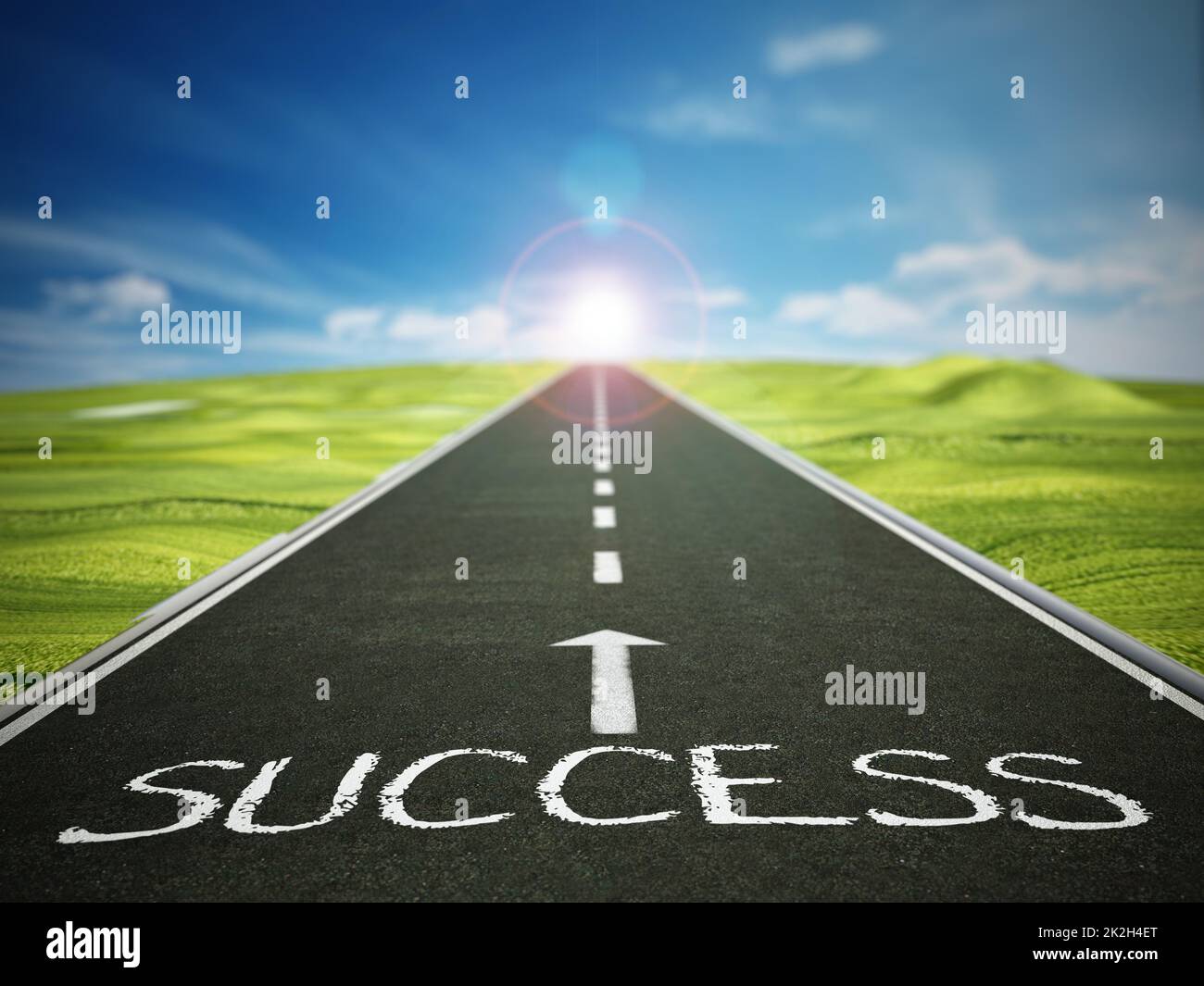 Asphalt road with arrow and success text against blue sky Stock Photo ...
