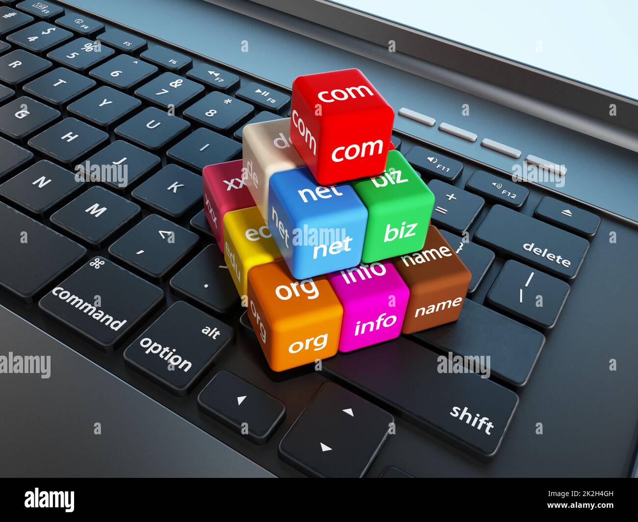 Domain name cubes standing on laptop computer keyboard Stock Photo - Alamy