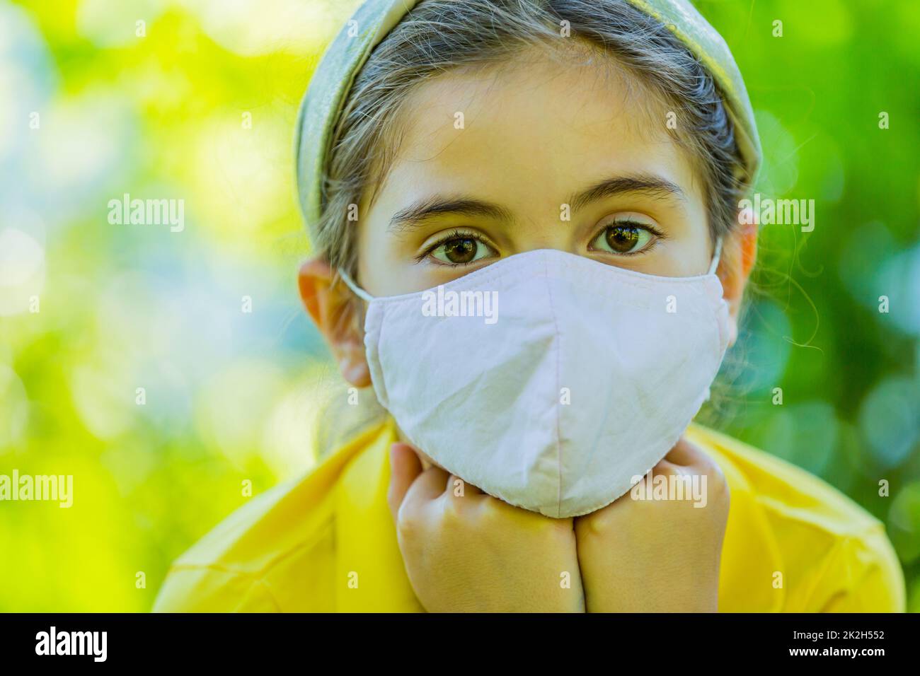 Little girl with mask Stock Photo - Alamy