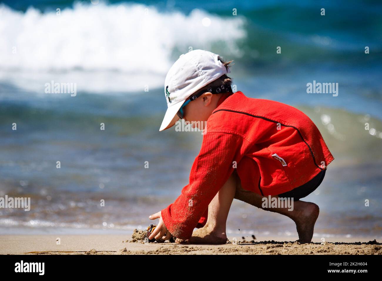 Fun with sand Stock Photo - Alamy