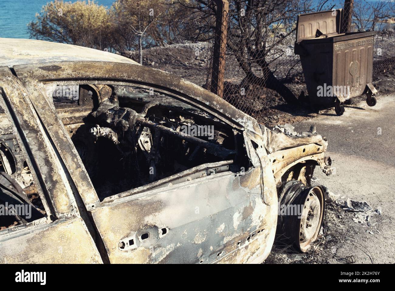 Izmir, Turkey - July 23, 2022: Burnt car aftermath the forest fire at ...