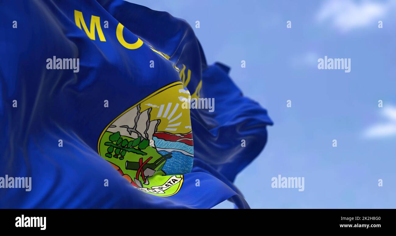 The US state flag of Montana waving in the wind Stock Photo - Alamy