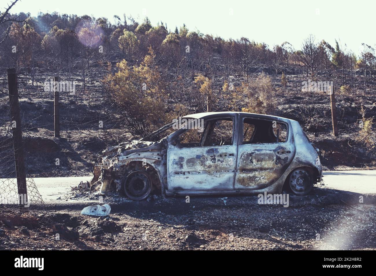 Izmir, Turkey - July 23, 2022: Side view of a Burnt car aftermath the ...