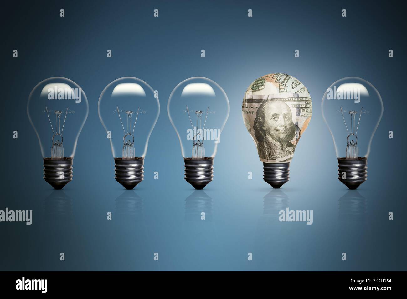 Five lightbulbs on a blue background and one of them wrapped with some ...
