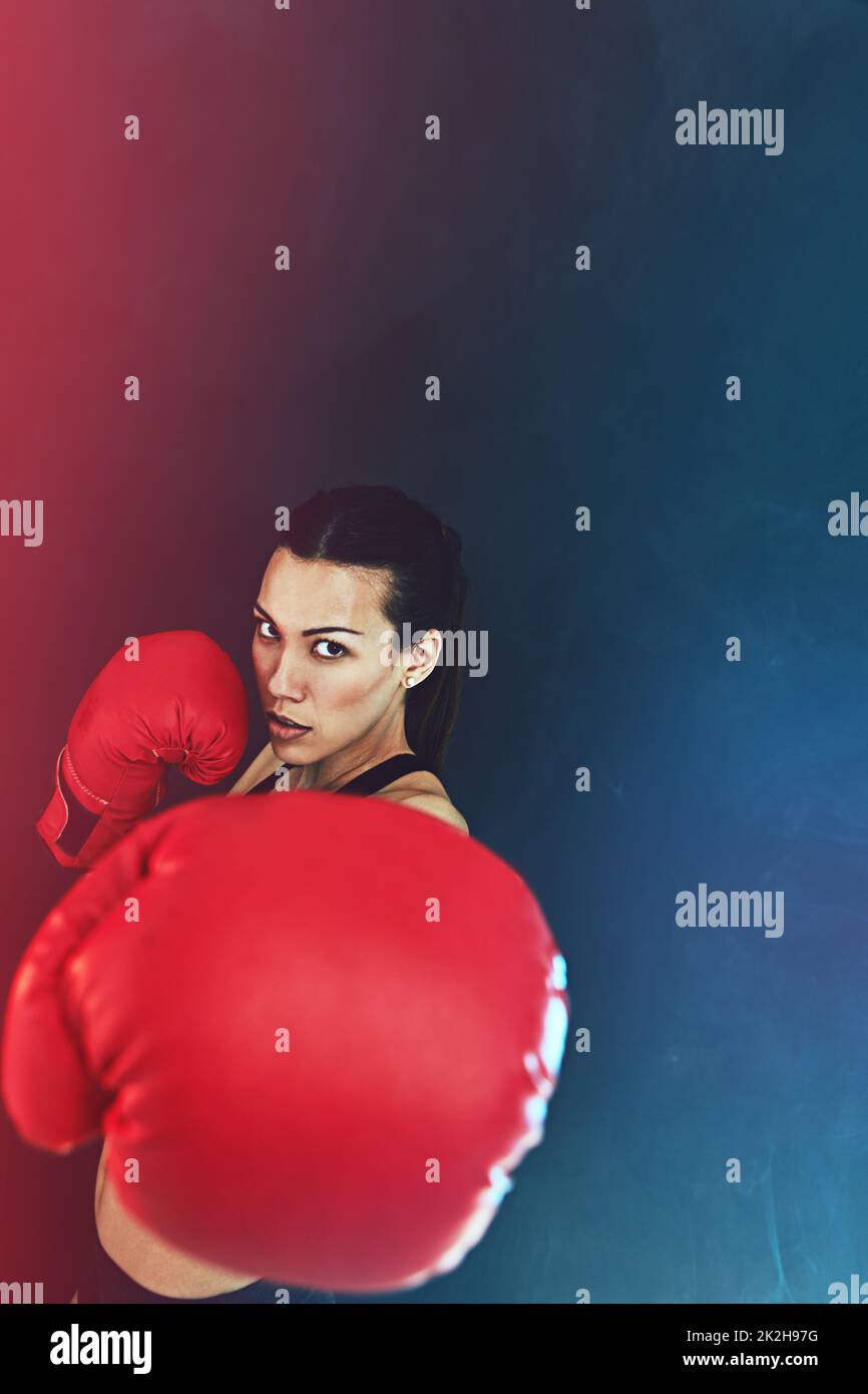 Woman wearing boxing gloves hi-res stock photography and images - Alamy