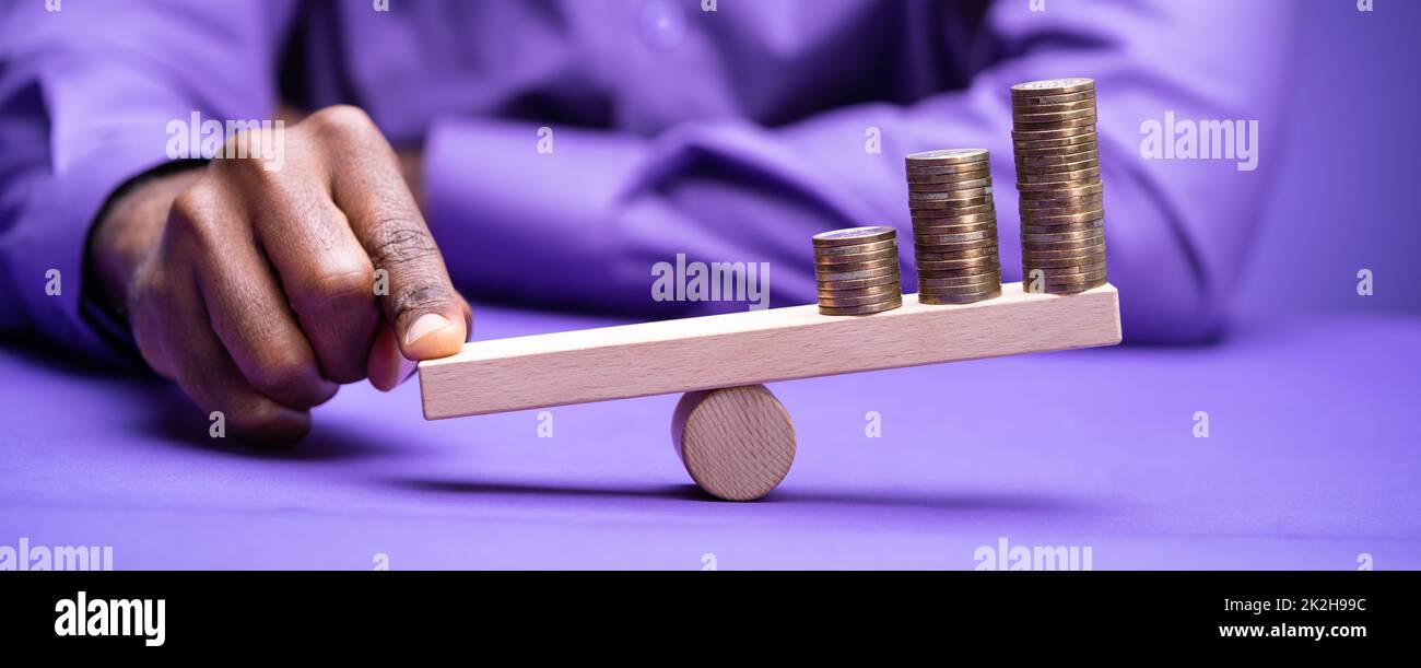 Money Leverage And Inflation Balance Stock Photo - Alamy