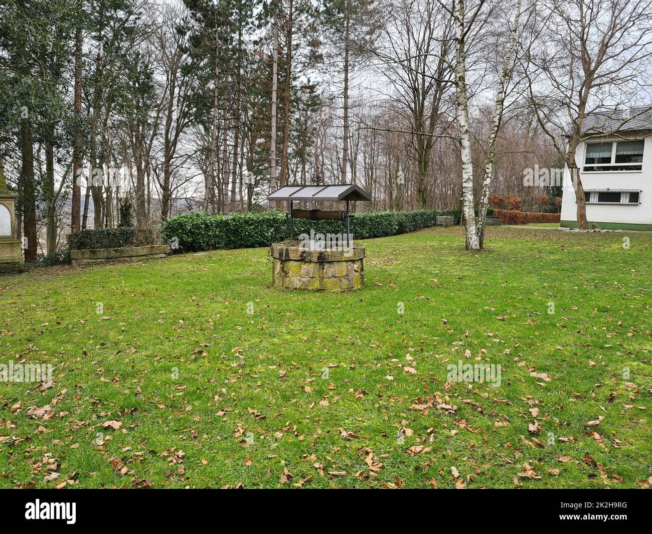 Old stone well with bucket hi-res stock photography and images - Alamy