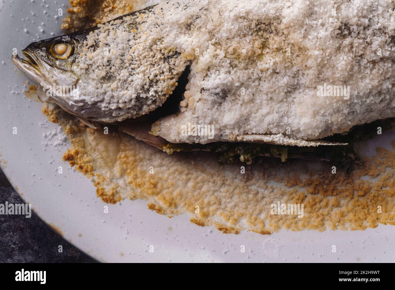 sicilian italian salt baked seabass fsh Stock Photo - Alamy