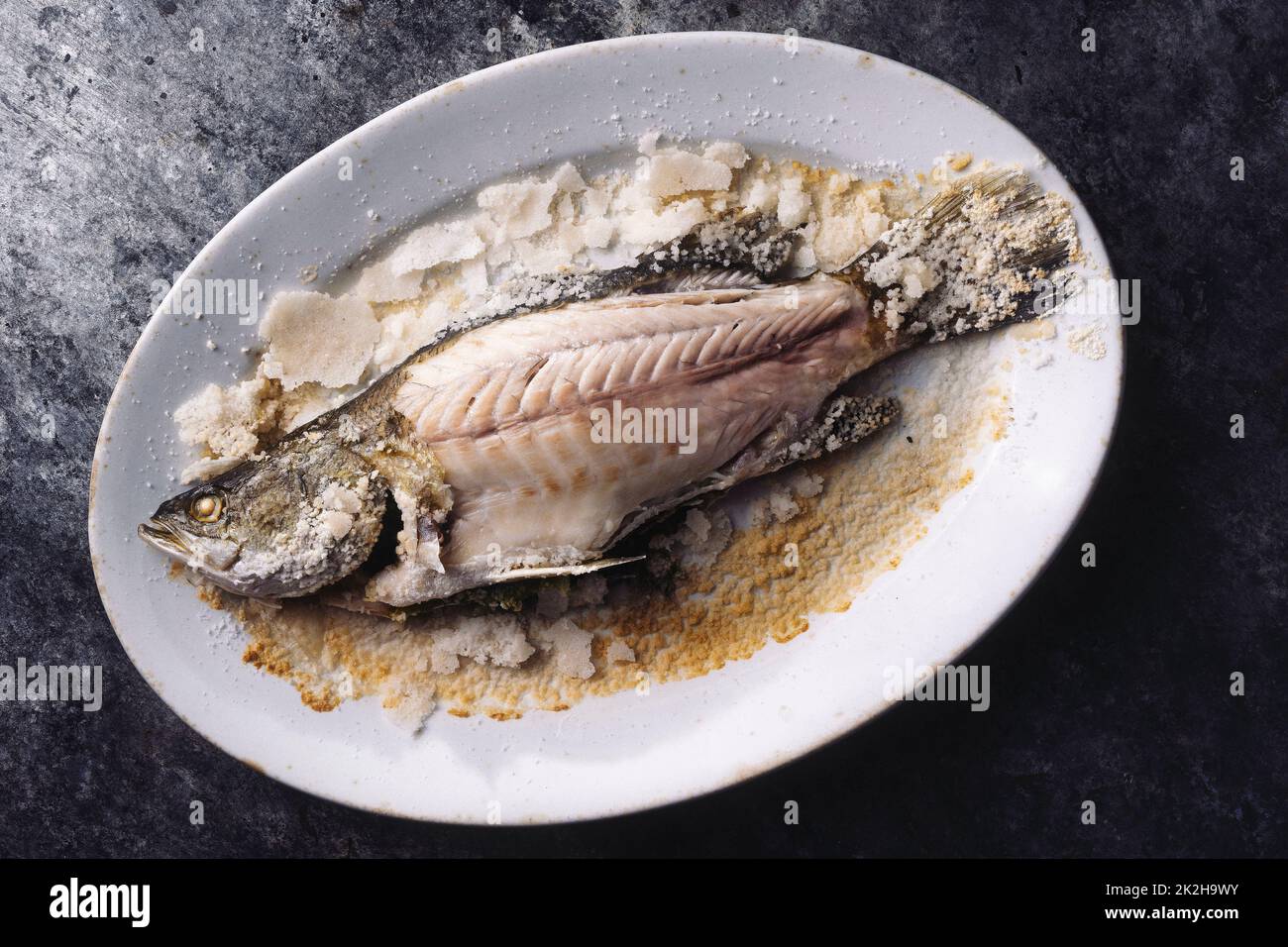 Baked seabass fish hi-res stock photography and images - Alamy