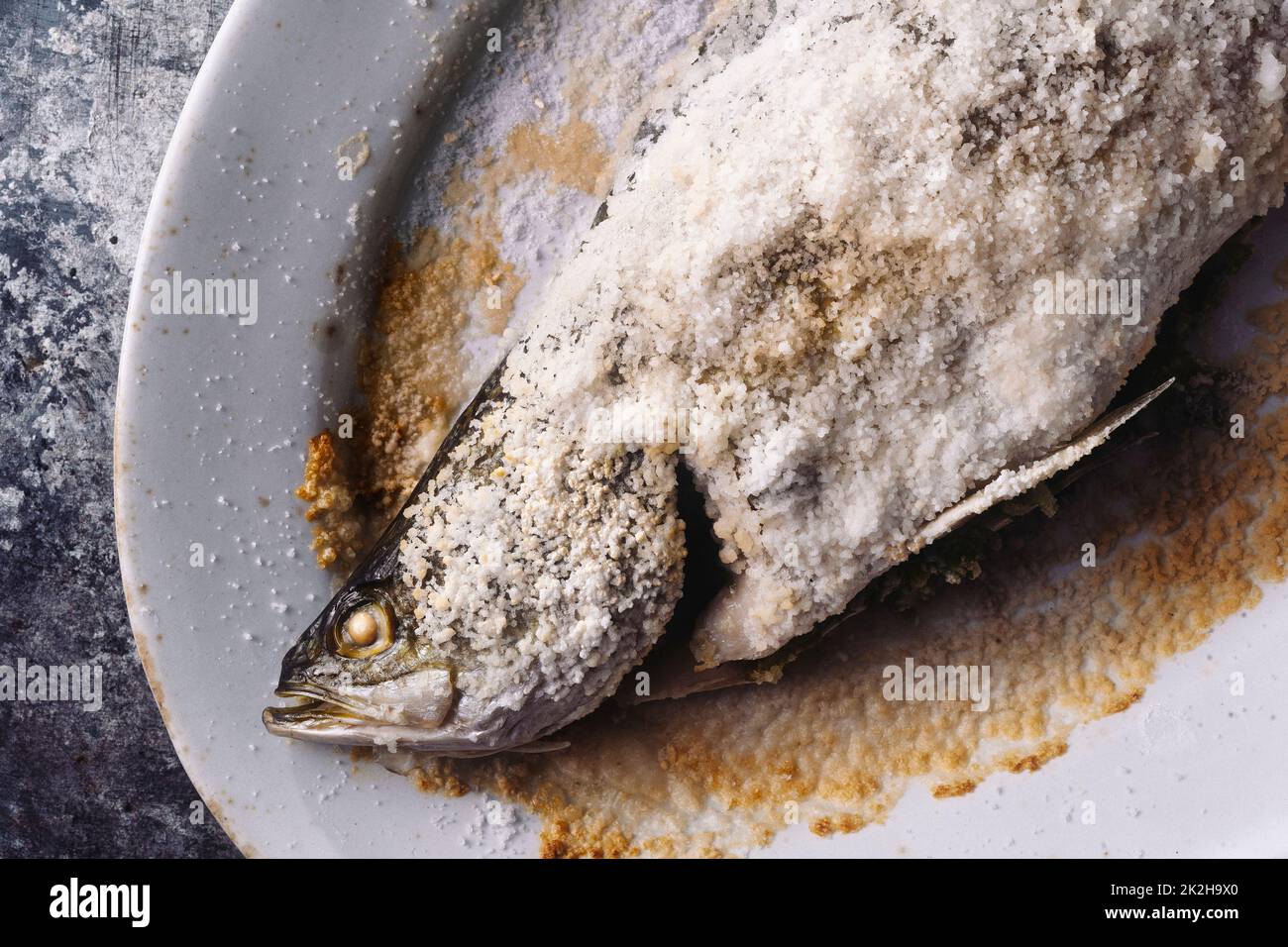 sicilian italian salt baked seabass fsh Stock Photo - Alamy