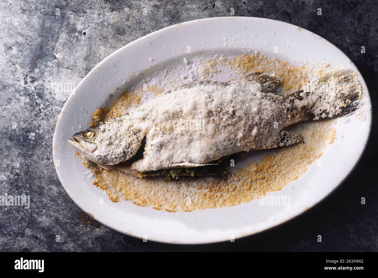 sicilian italian salt baked seabass fsh Stock Photo - Alamy