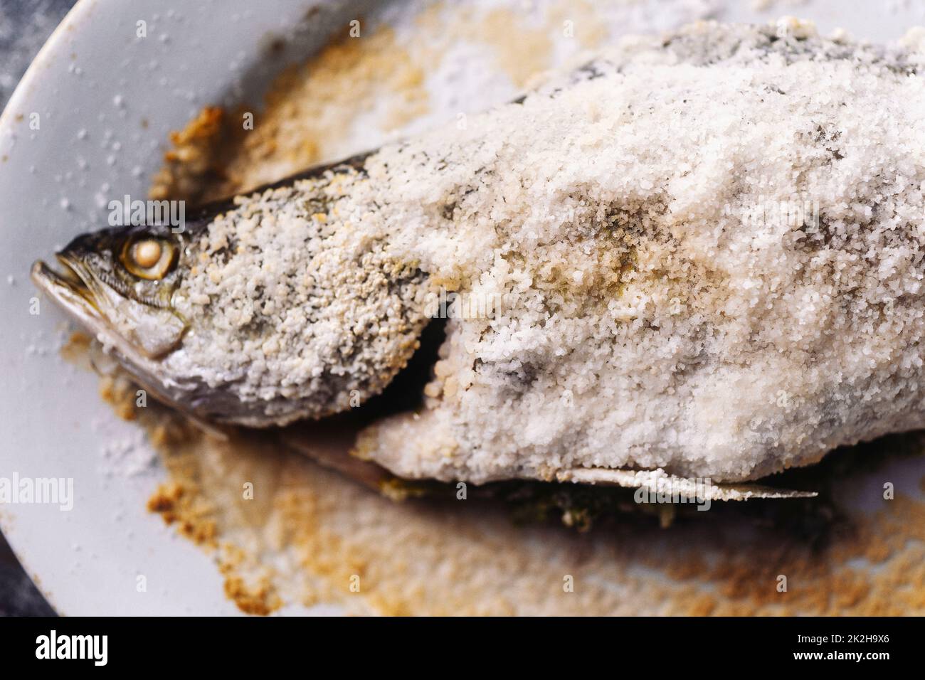 sicilian italian salt baked seabass fsh Stock Photo - Alamy