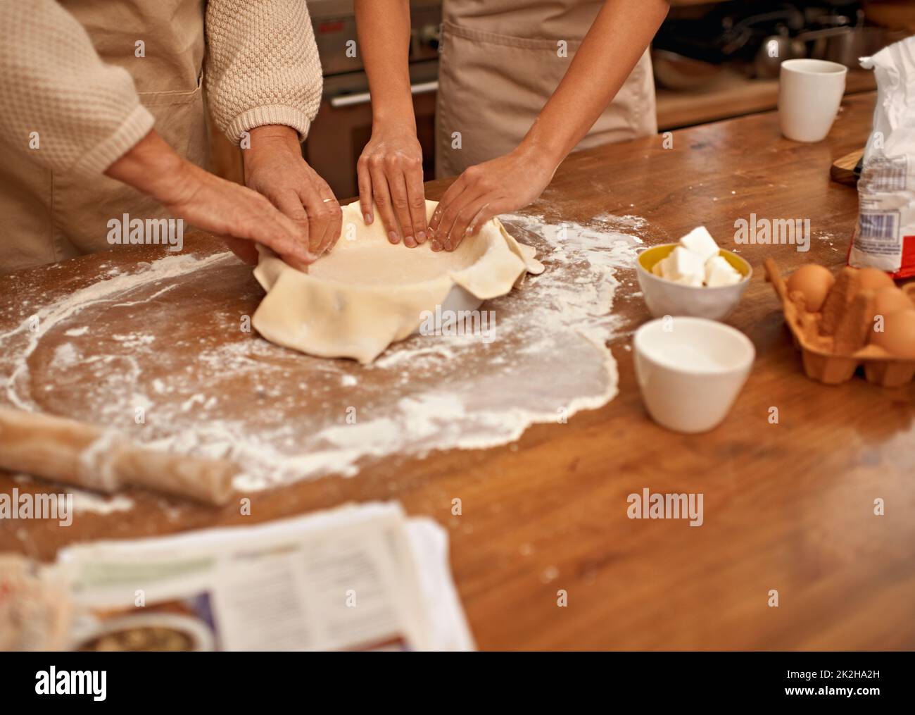 Theres an art to this. A cropped view of hands working the dough while ...