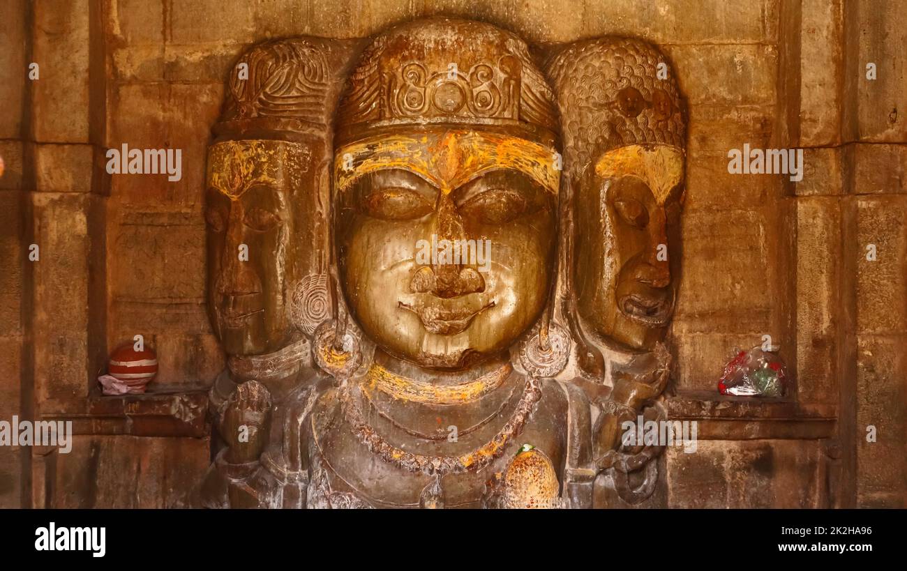 Sculpture of three faced Lord Shiva inside the Trimukh Shivmandir ...
